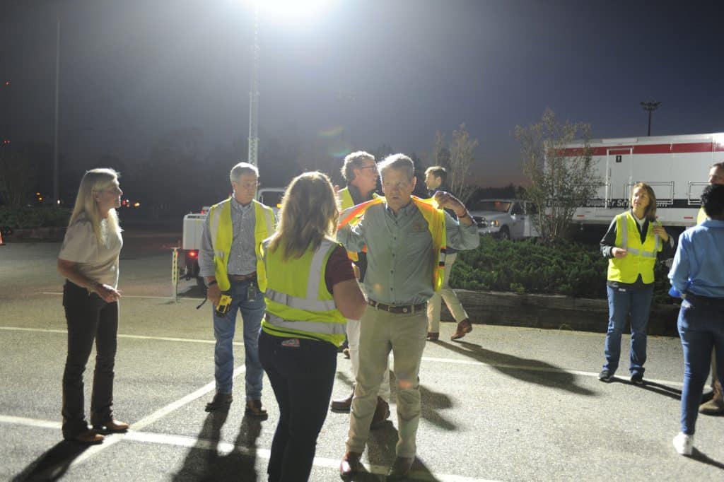 Kemp stops at power crew staging site on post-Helene tour – Courier ...