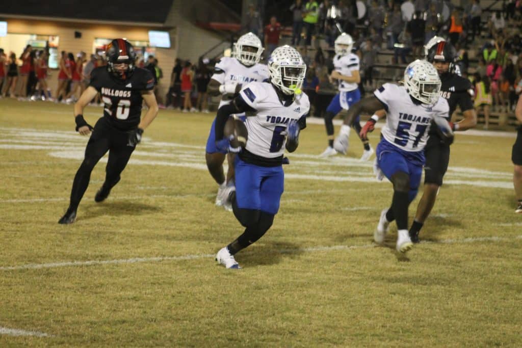 FOOTBALL: Johnson County runs past GMC to tack fourth win onto region ...